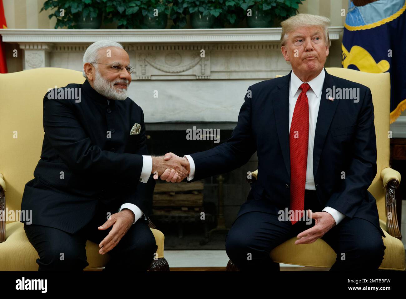 President Donald Trump shakes hands with Indian Prime Minister Narendra ...