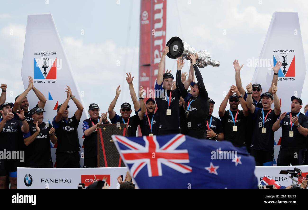 Emirates Team New Zealand helmsman Peter Burling and holds the Americas ...