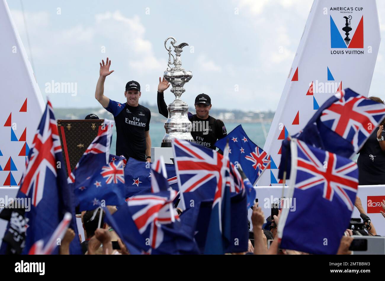 Emirates Team New Zealand helmsman Peter Burling, left, and teammate ...
