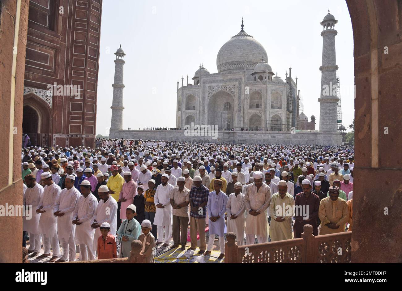 Indian Muslims offer prayers at a mosque in the premises of the Taj ...
