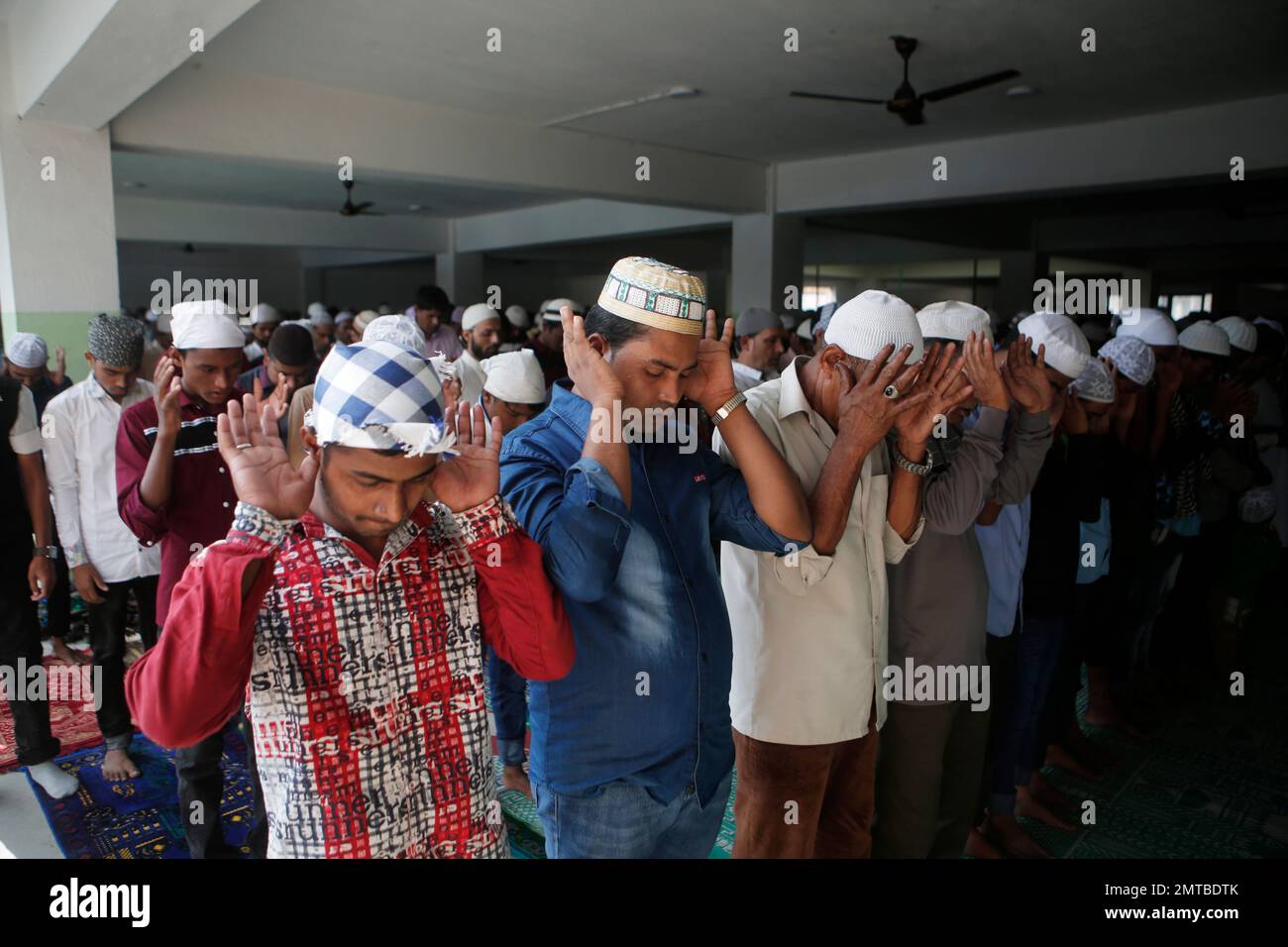 Nepalese Muslims offer Eid al-Fitr prayers at a mosque in Kathmandu ...