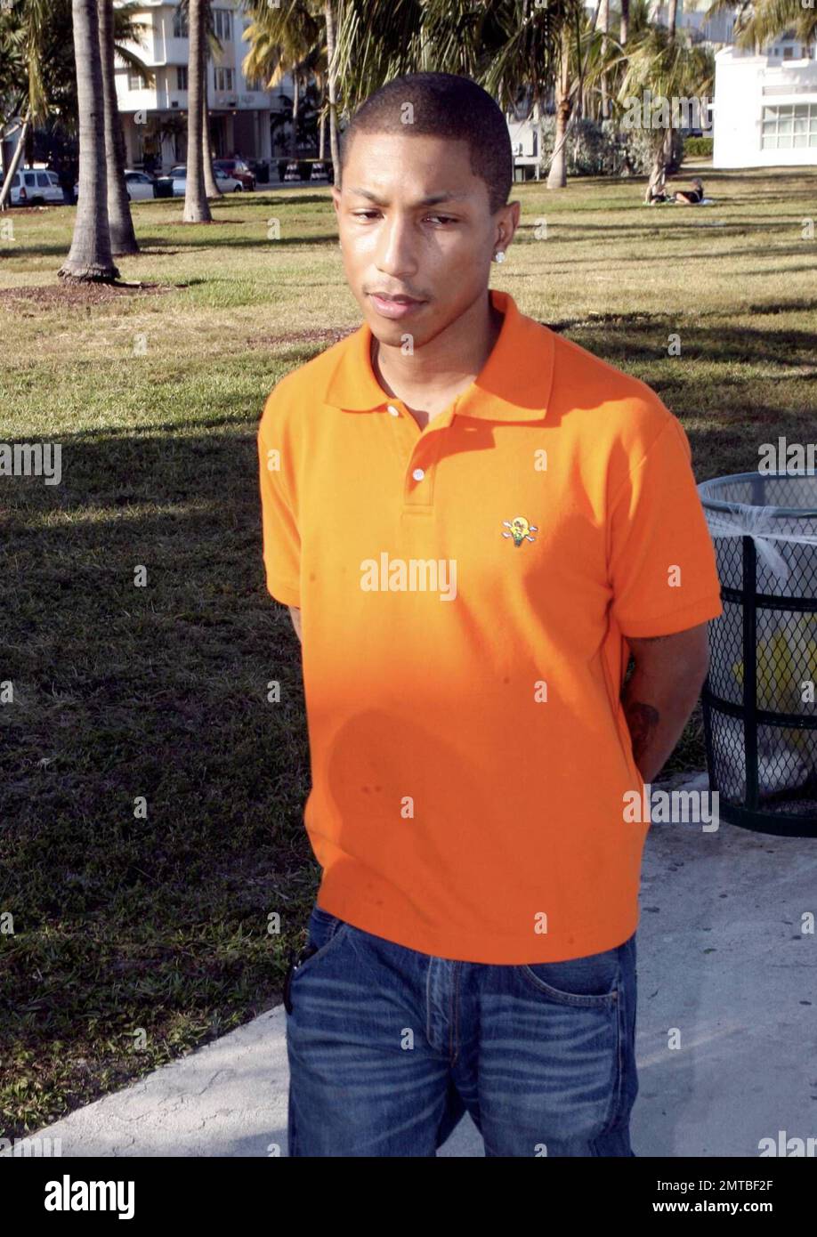 Exclusive!! Pharrell Williams takes a stroll with pals on Ocean Drive ...