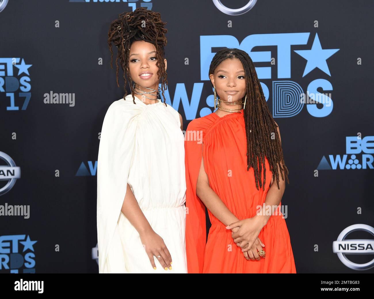 Chloe Bailey, left, and Halle Bailey arrive at the BET Awards at the ...