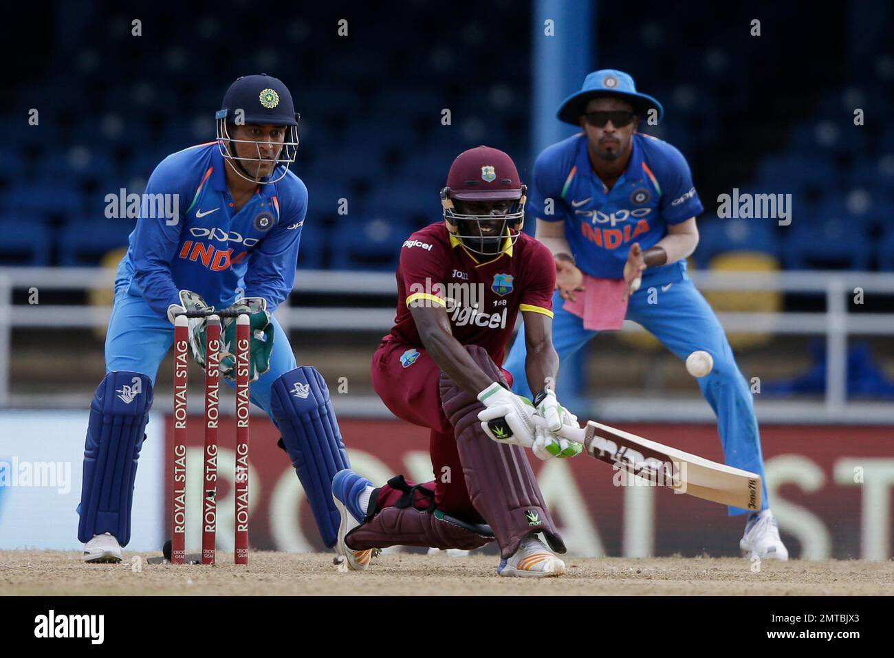 West Indies' Jonathan Carter plays a shot from the bowling of India's ...