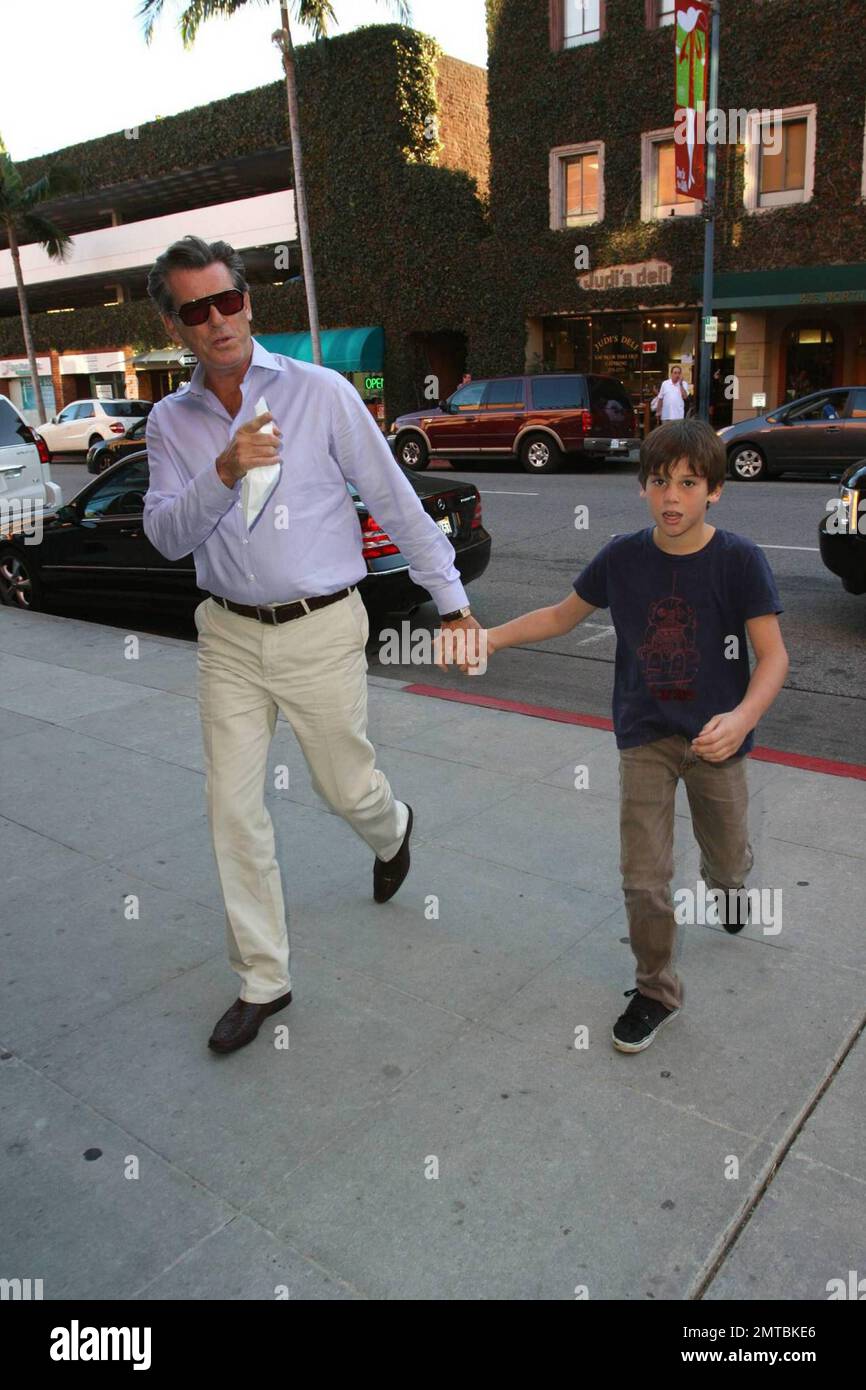 Pierce Brosnan 'Bonds' with his son Dylan as they walk hand in hand ...