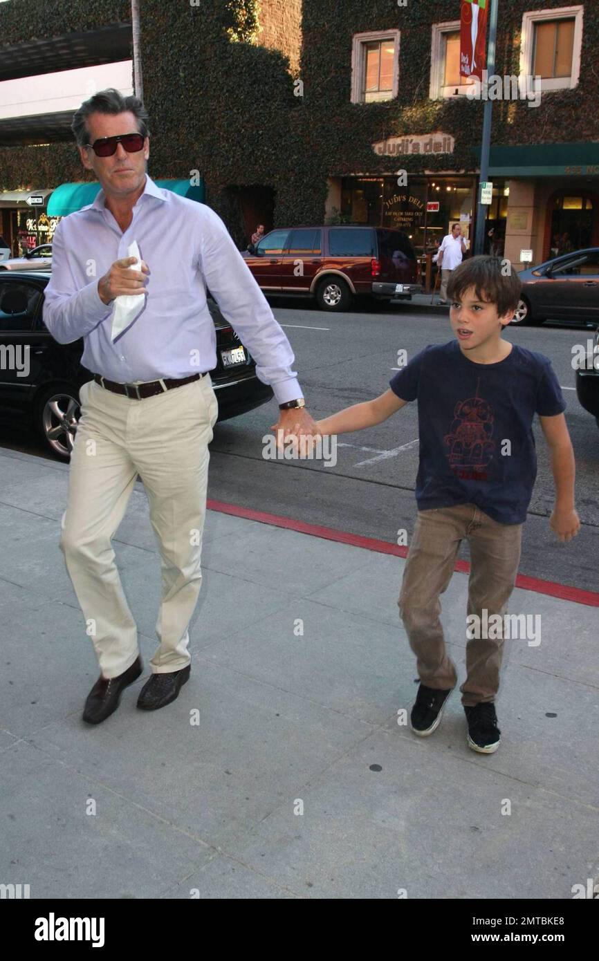 Pierce Brosnan 'Bonds' with his son Dylan as they walk hand in hand ...
