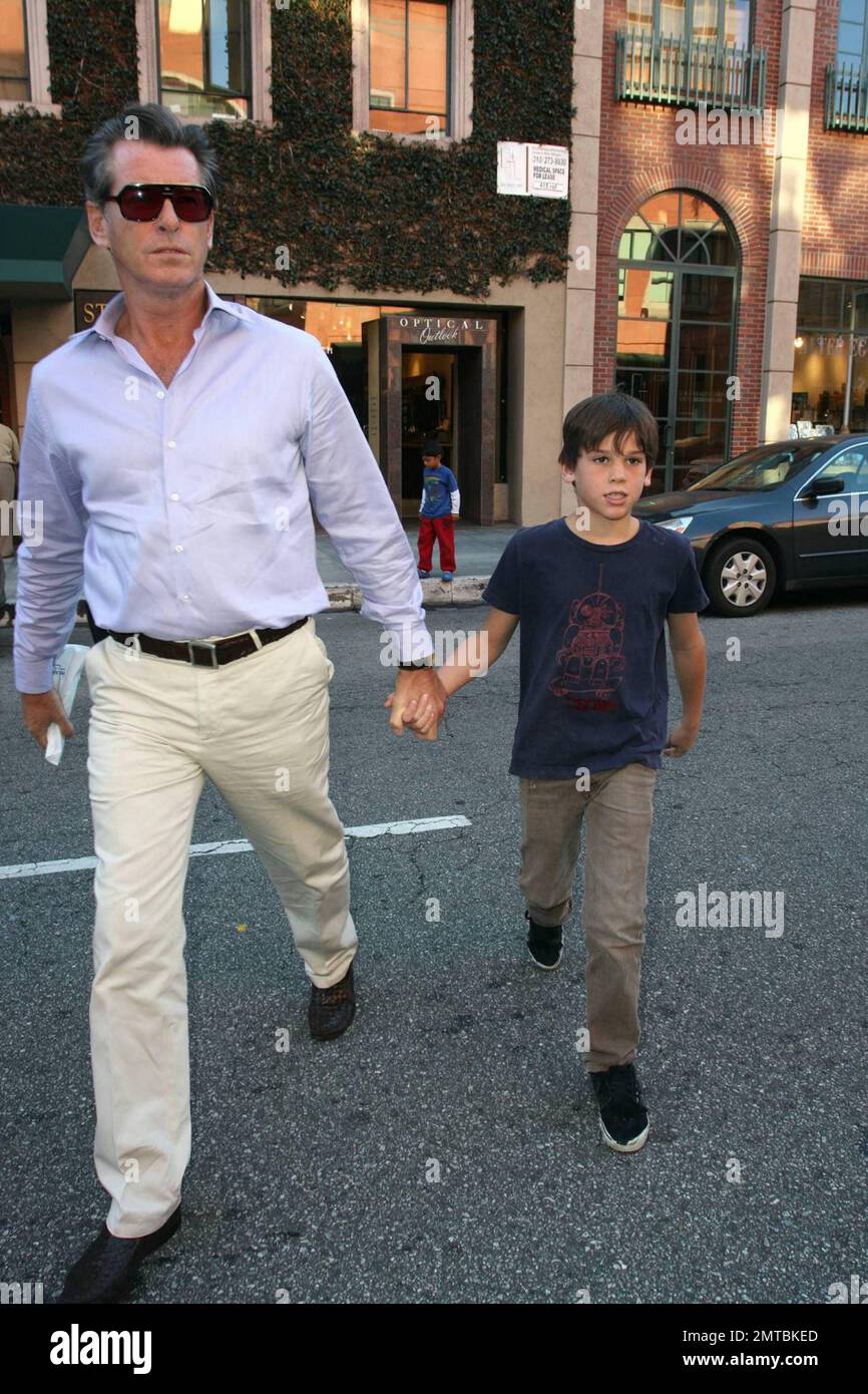 - Pierce Brosnan 'Bonds' with his son Dylan as they walk hand in hand ...