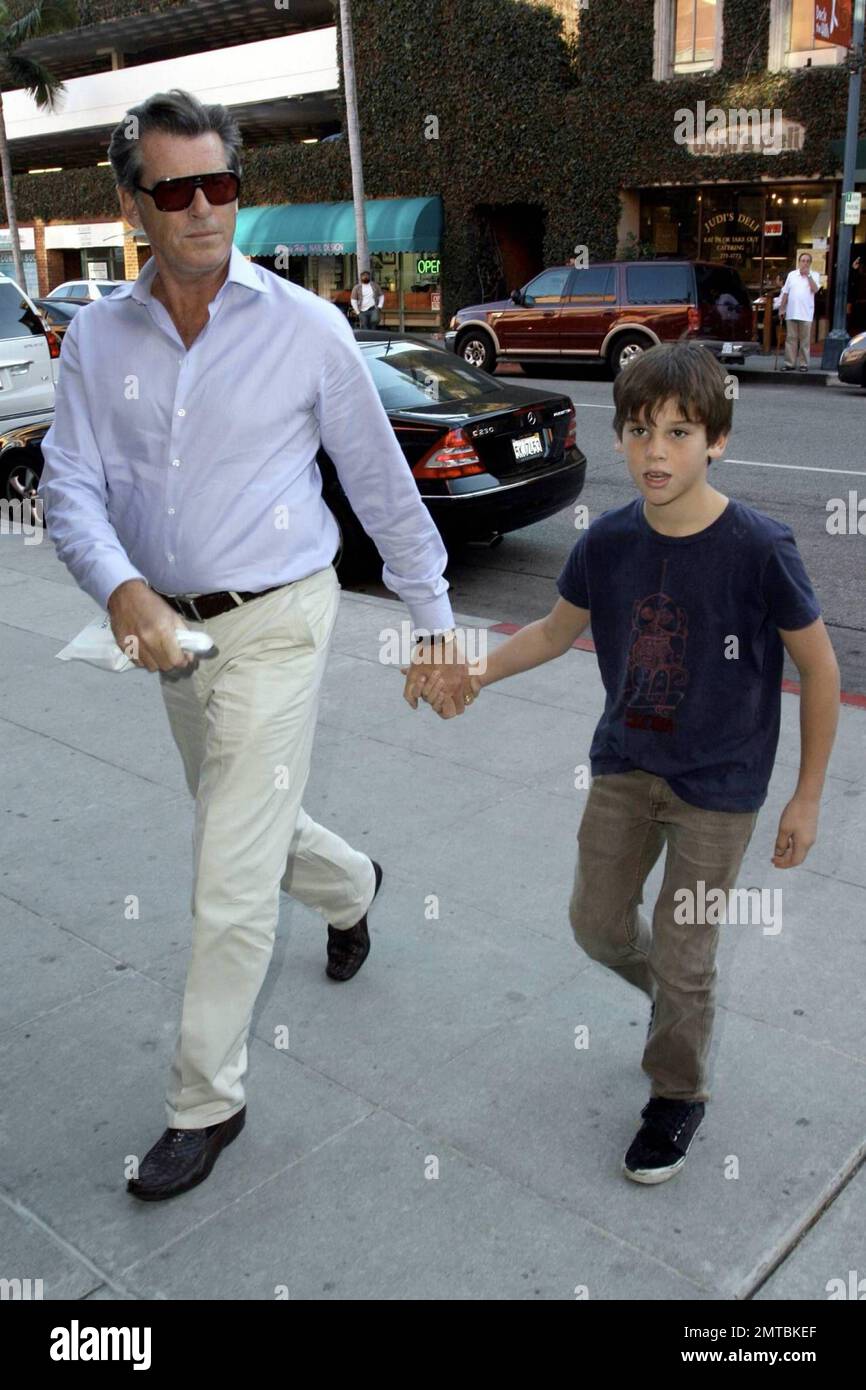 Pierce Brosnan 'Bonds' with his son Dylan as they walk hand in hand ...