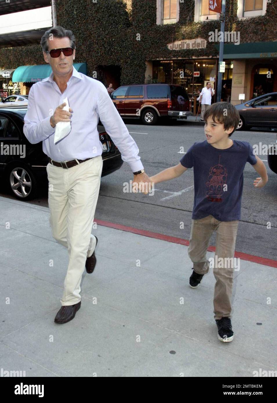 - Pierce Brosnan 'Bonds' with his son Dylan as they walk hand in hand ...