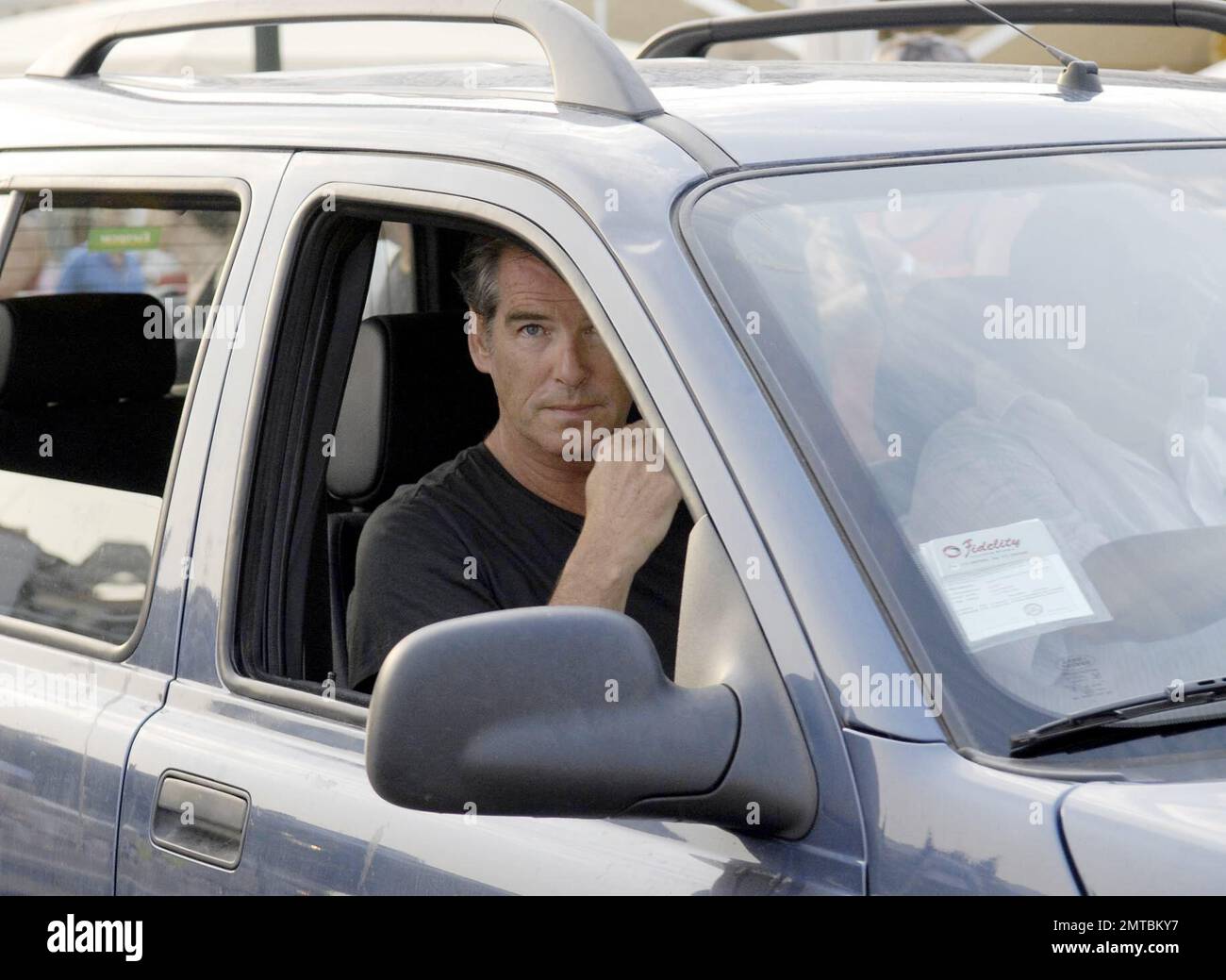 Actor Pierce Brosnan takes a break from filming "Mama Mia" with Tom ...