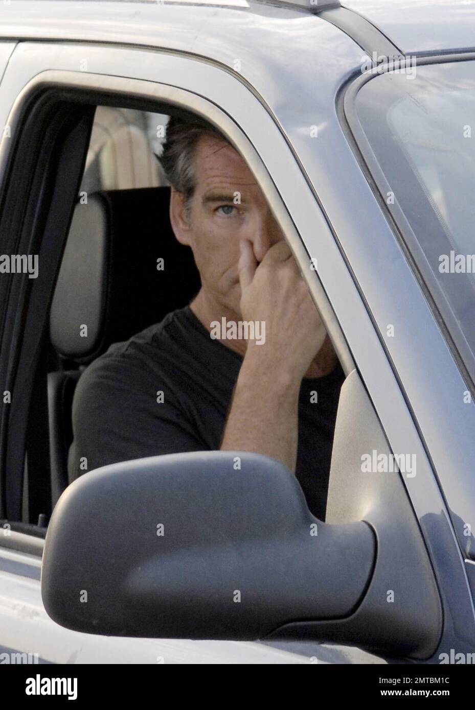 Actor Pierce Brosnan takes a break from filming "Mama Mia" with Tom ...