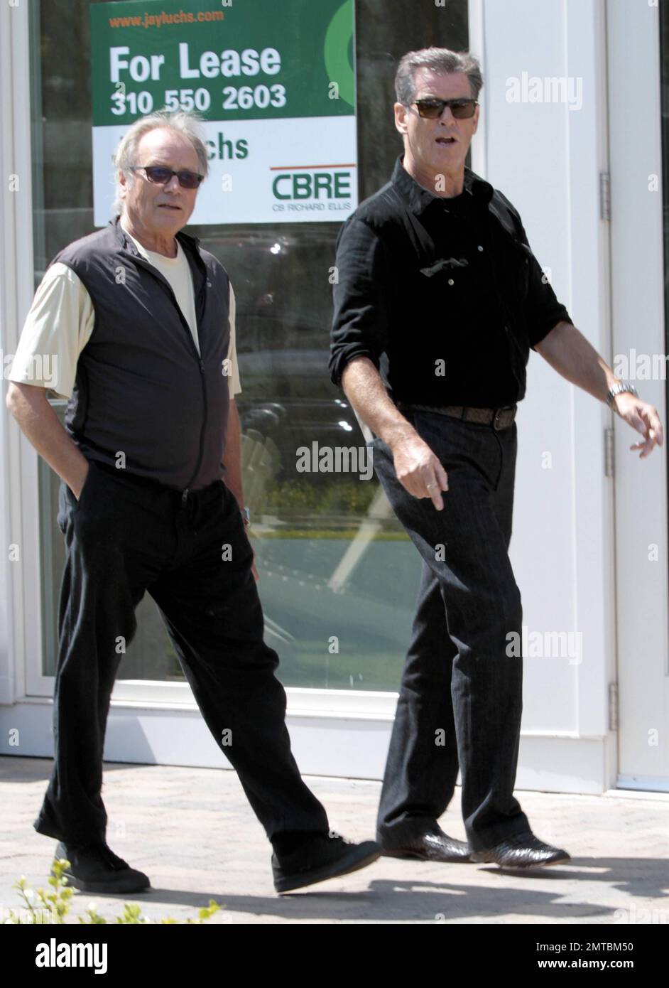 EXCLUSIVE!! Actor Pierce Brosnan walks with a friend at the Cross Creek ...