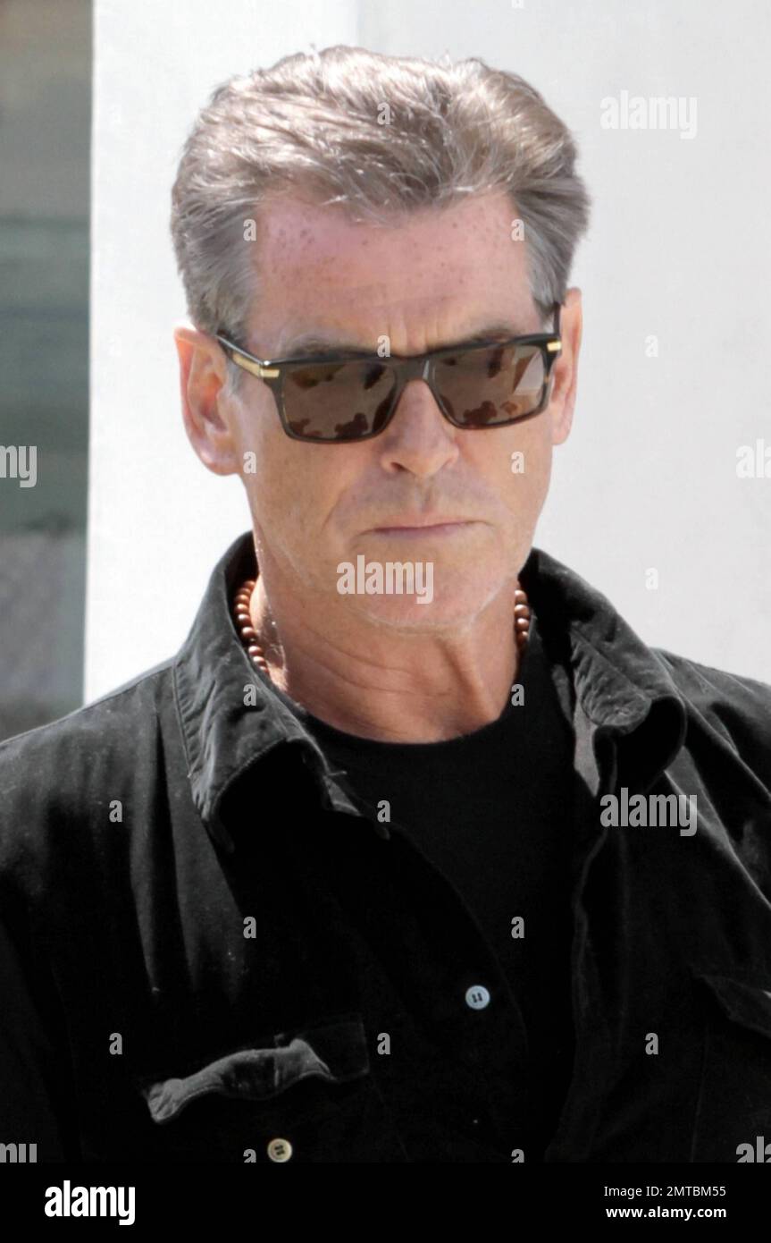 EXCLUSIVE!! Actor Pierce Brosnan walks with a friend at the Cross Creek ...