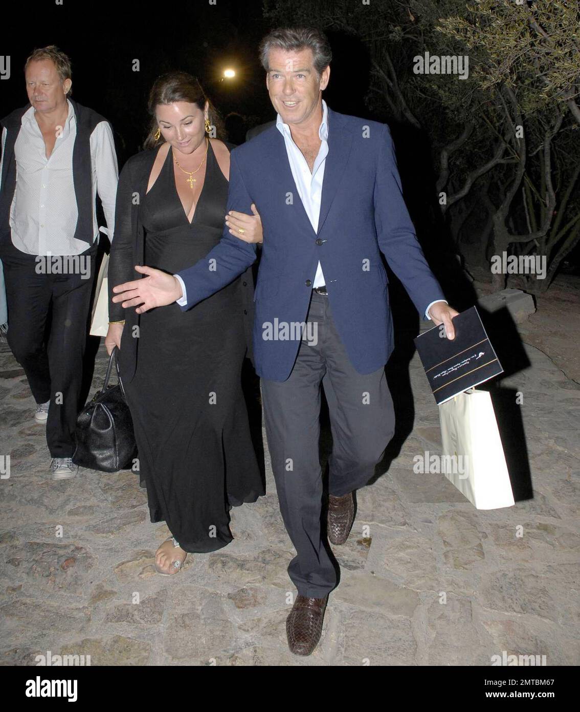 Pierce Brosnan and Stellan Skarsgard attend a concert in memory of ...