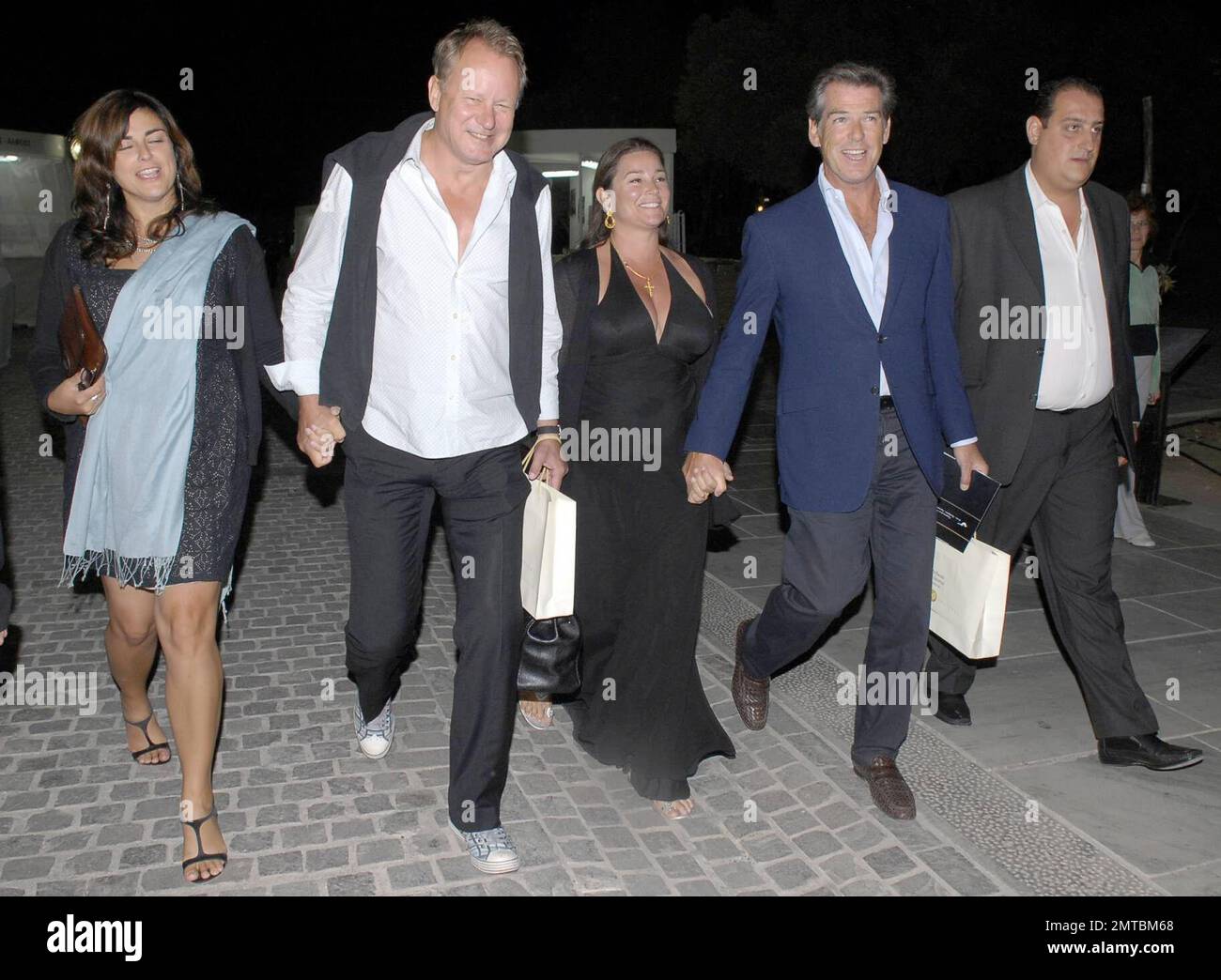 Pierce Brosnan and Stellan Skarsgard attend a concert in memory of ...