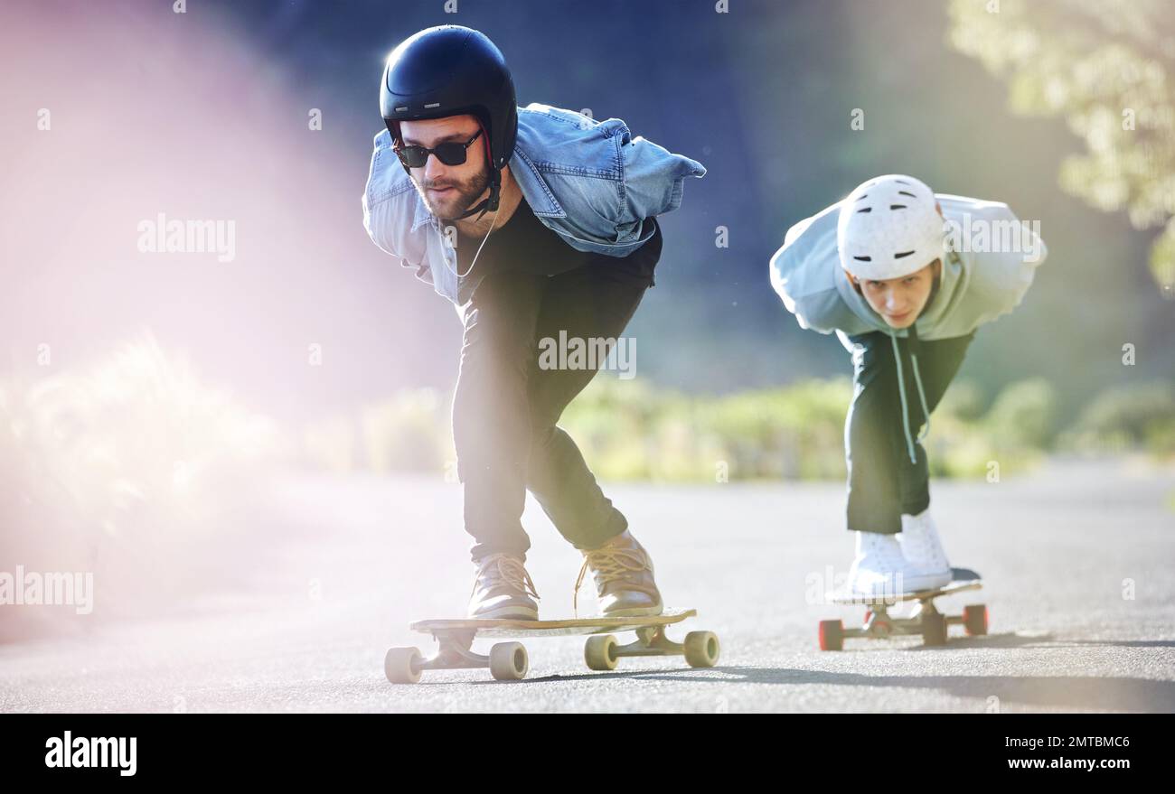 Sports, speed and safety, longboard skating in road, friends racing ...