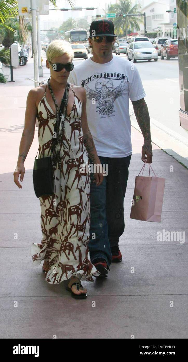 Tattooed singer Pink and Husband Carey Hart board her tour bus at her ...