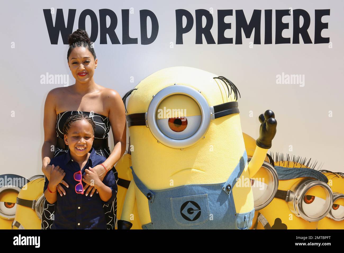 Tia Mowry, back, and daughter Cree Taylor Hardrict arrive at the World ...