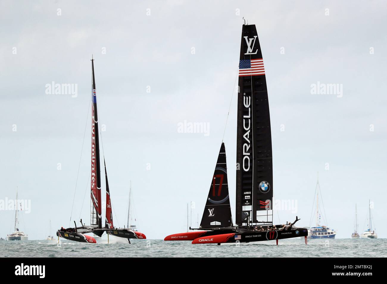 Oracle Team USA, right, races Emirates Team New Zealand during the ...