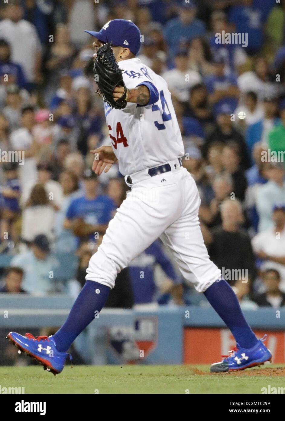 Los Angeles Dodgers pitcher Sergio Romo celebrates the team's 6-1 win ...