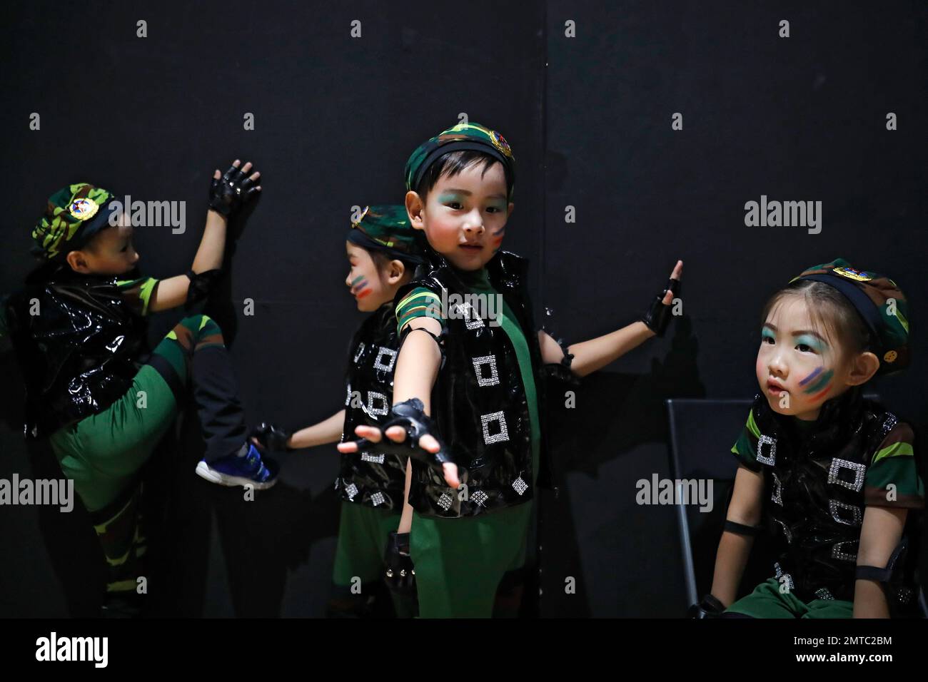 In this Friday, June 23, 2017 photo, kindergarten children wearing ...