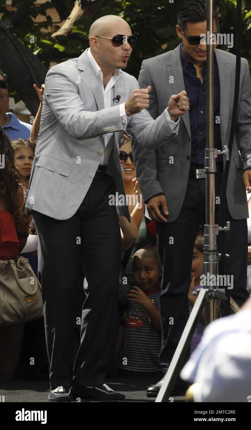 Rapper Pitbull makes an appearance for an interview with Mario Lopez at ...