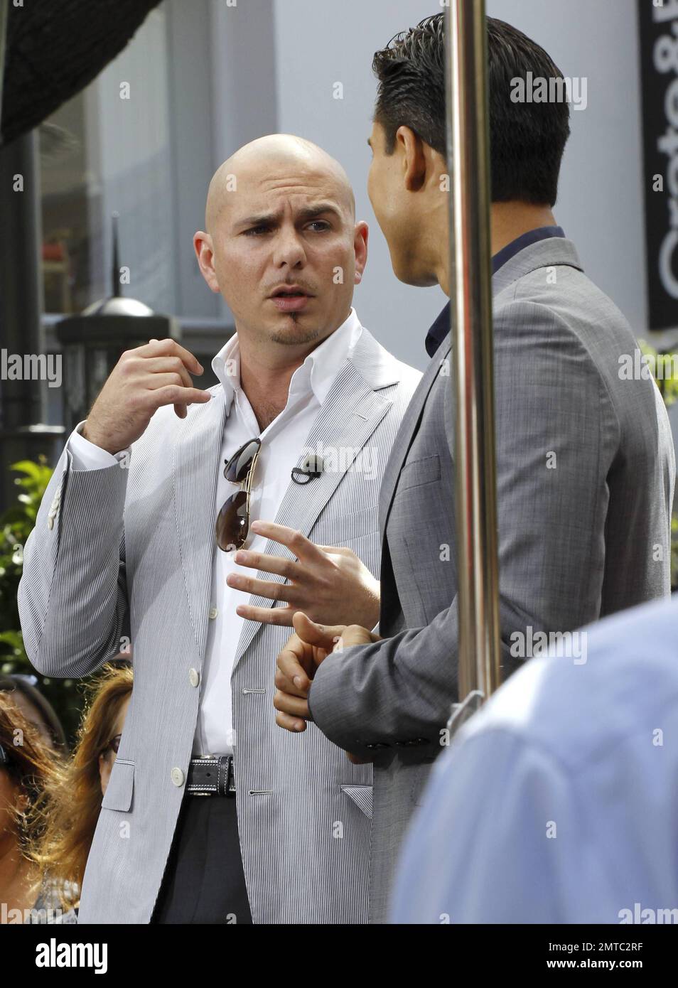 Rapper Pitbull makes an appearance for an interview with Mario Lopez at ...