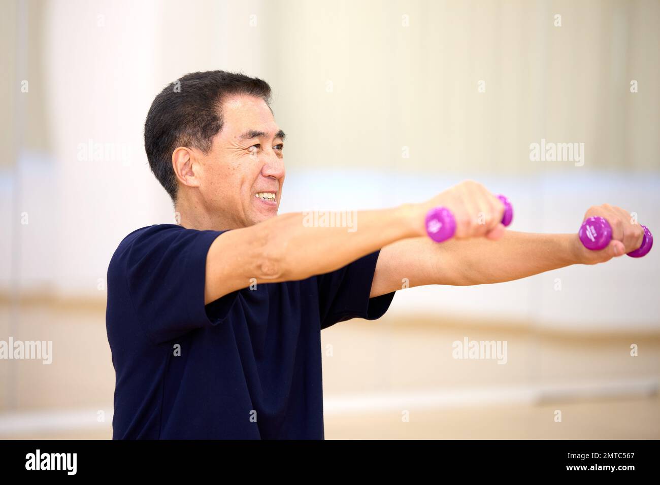 Japanese senior man training at indoor gym Stock Photo - Alamy