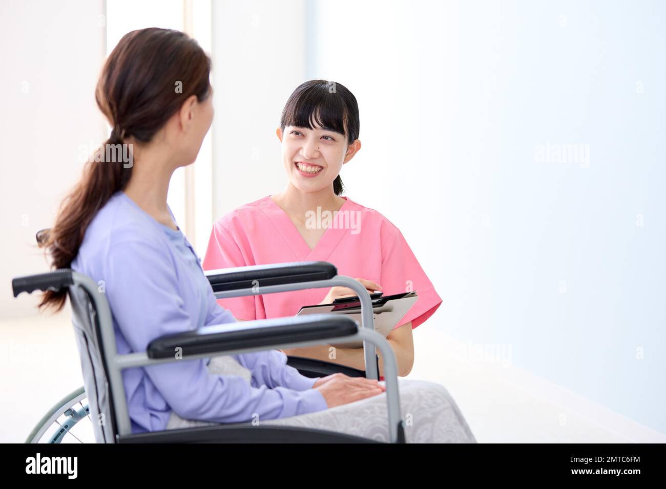 Young asian woman nurse caregiver hi-res stock photography and images ...