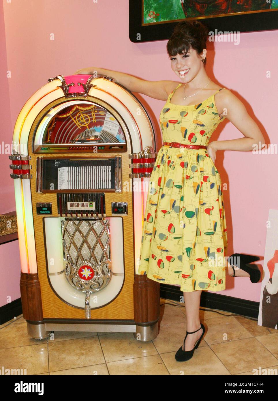 Playboy Playmate of the Year 2011 Claire Sinclair poses and signs ...