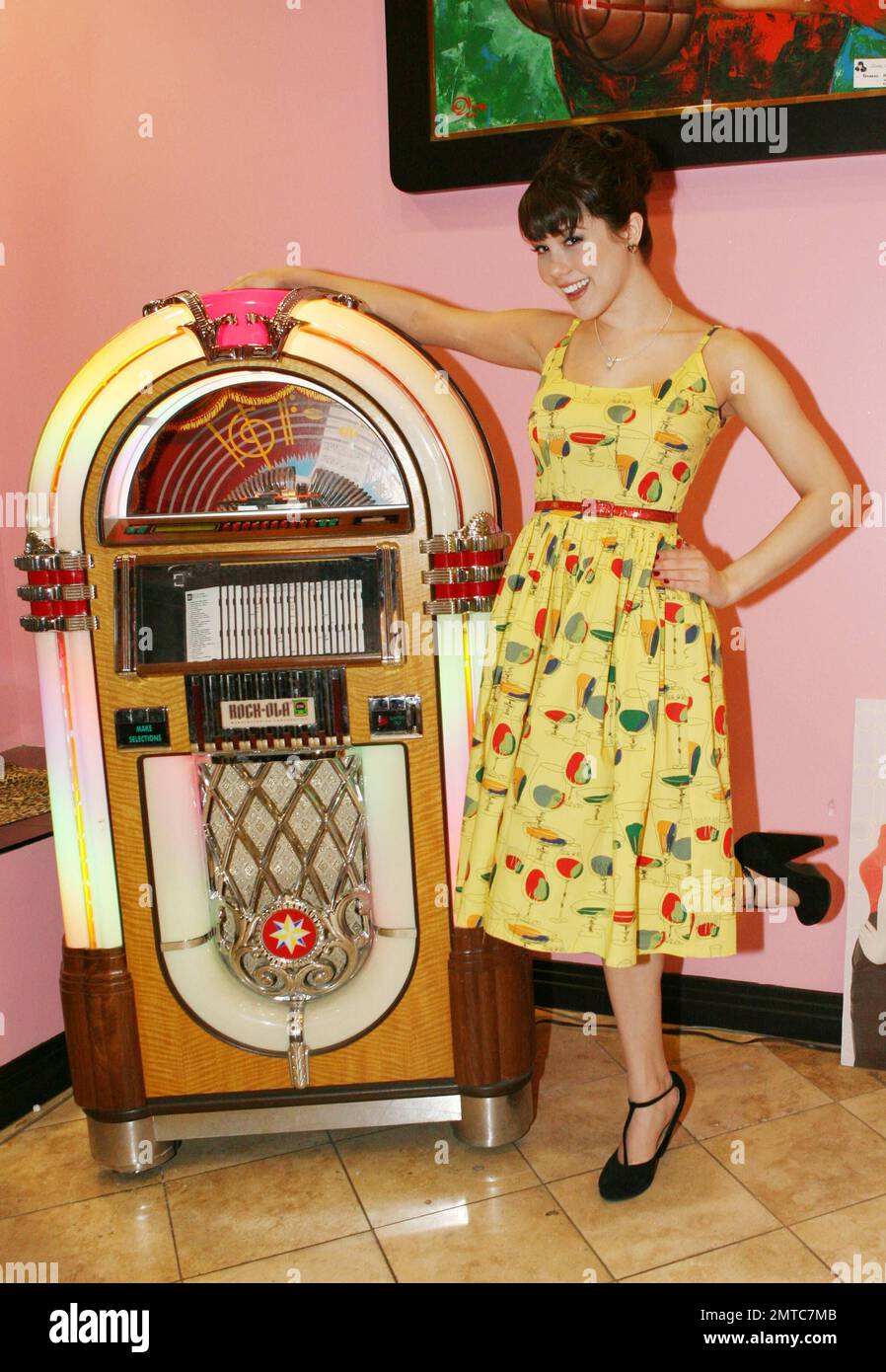 Playboy Playmate of the Year 2011 Claire Sinclair poses and signs ...