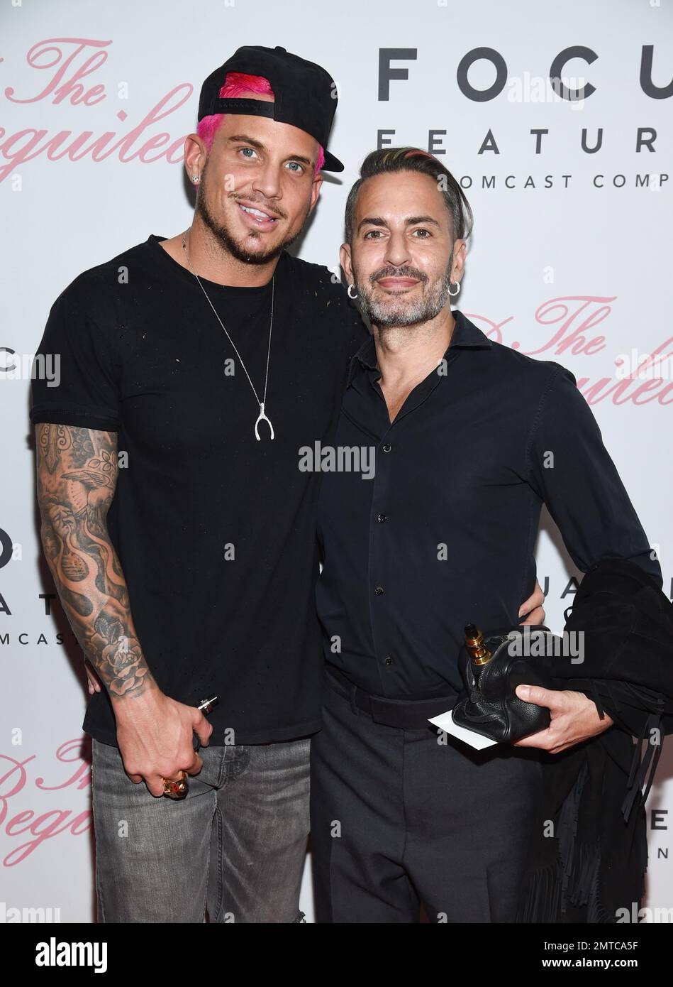 Fashion designer Marc Jacobs, right, and boyfriend Char Defrancesco ...