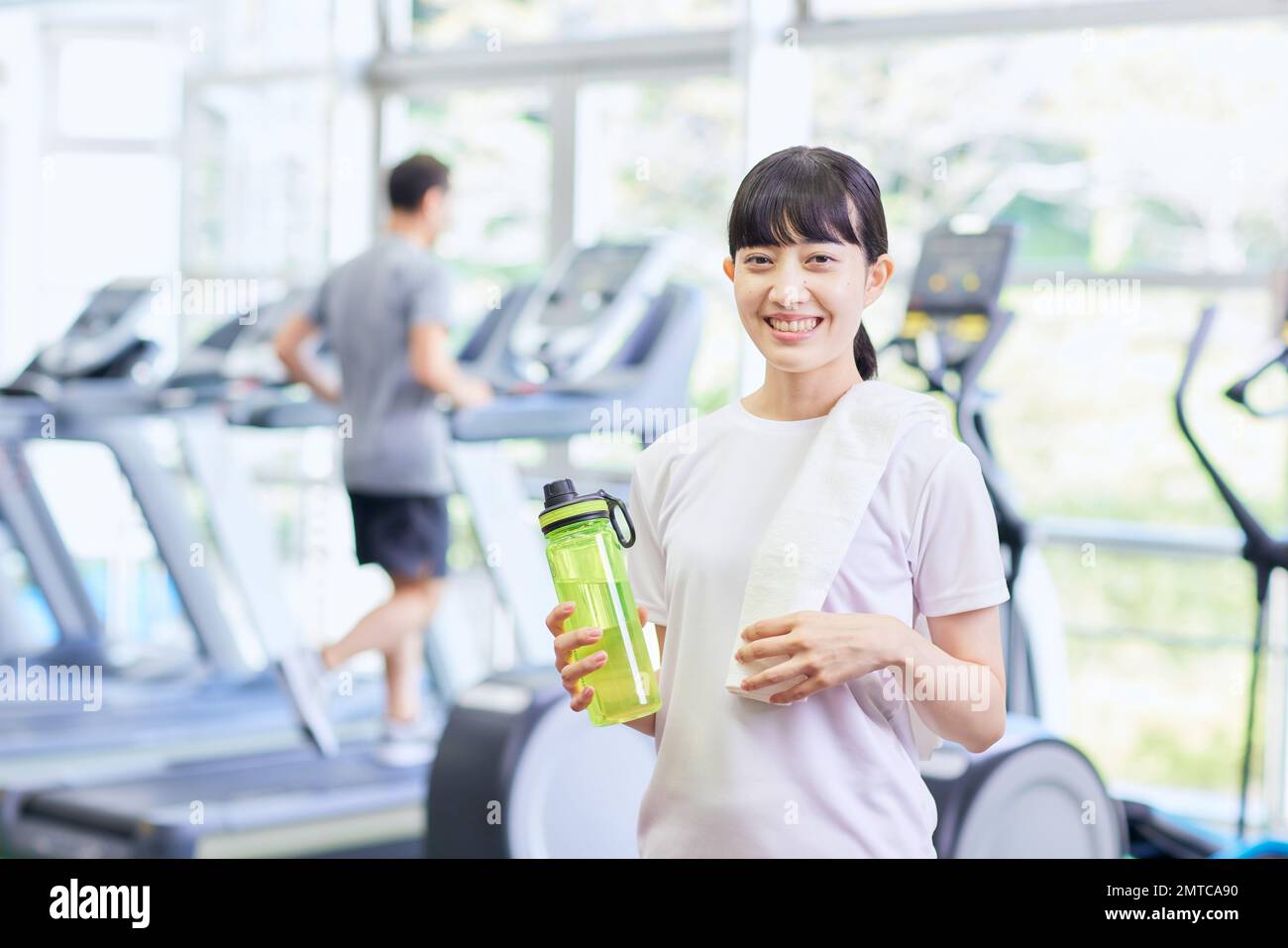 Japanese woman training at indoor gym Stock Photo - Alamy