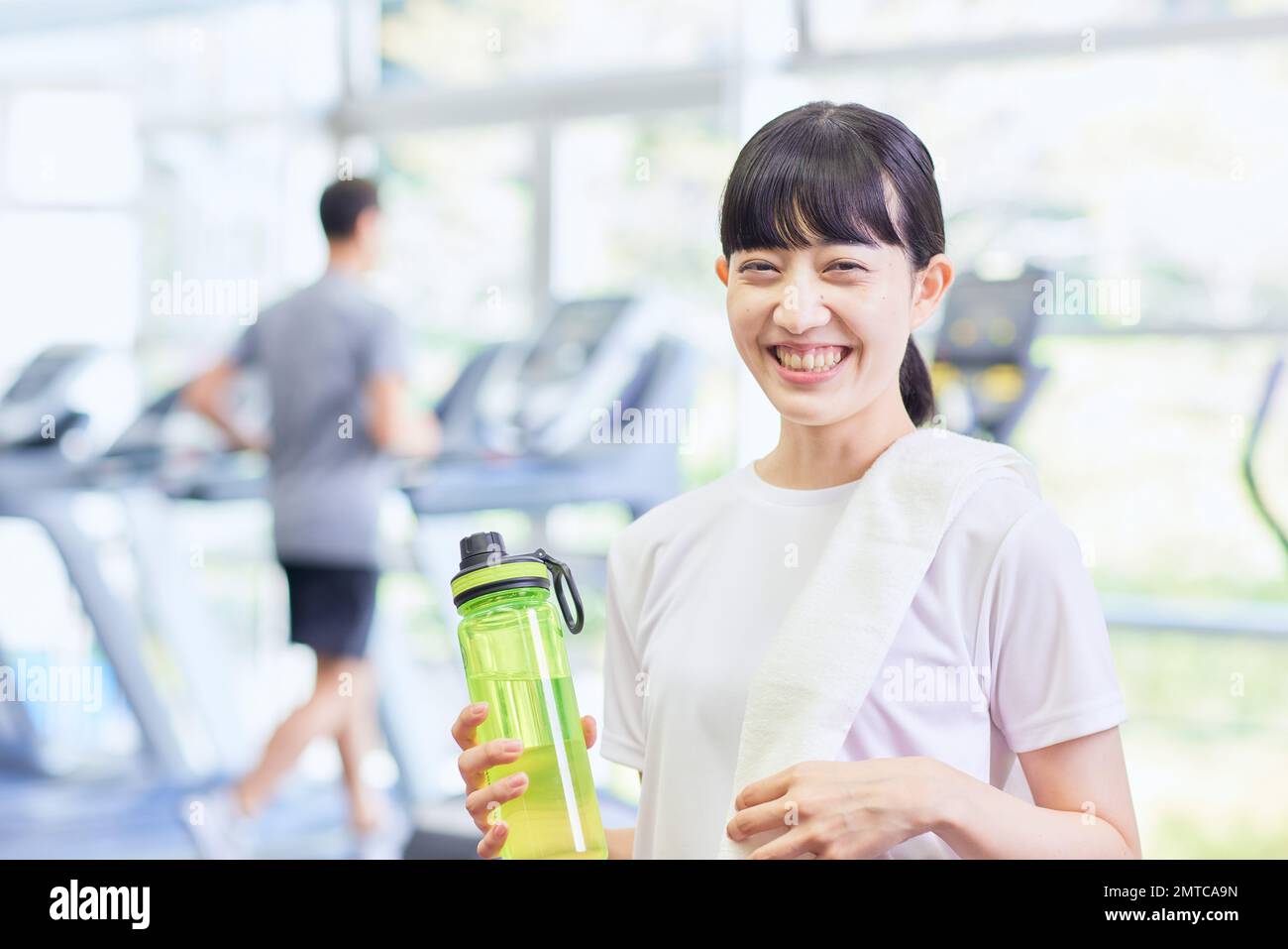 Japanese woman training at indoor gym Stock Photo - Alamy