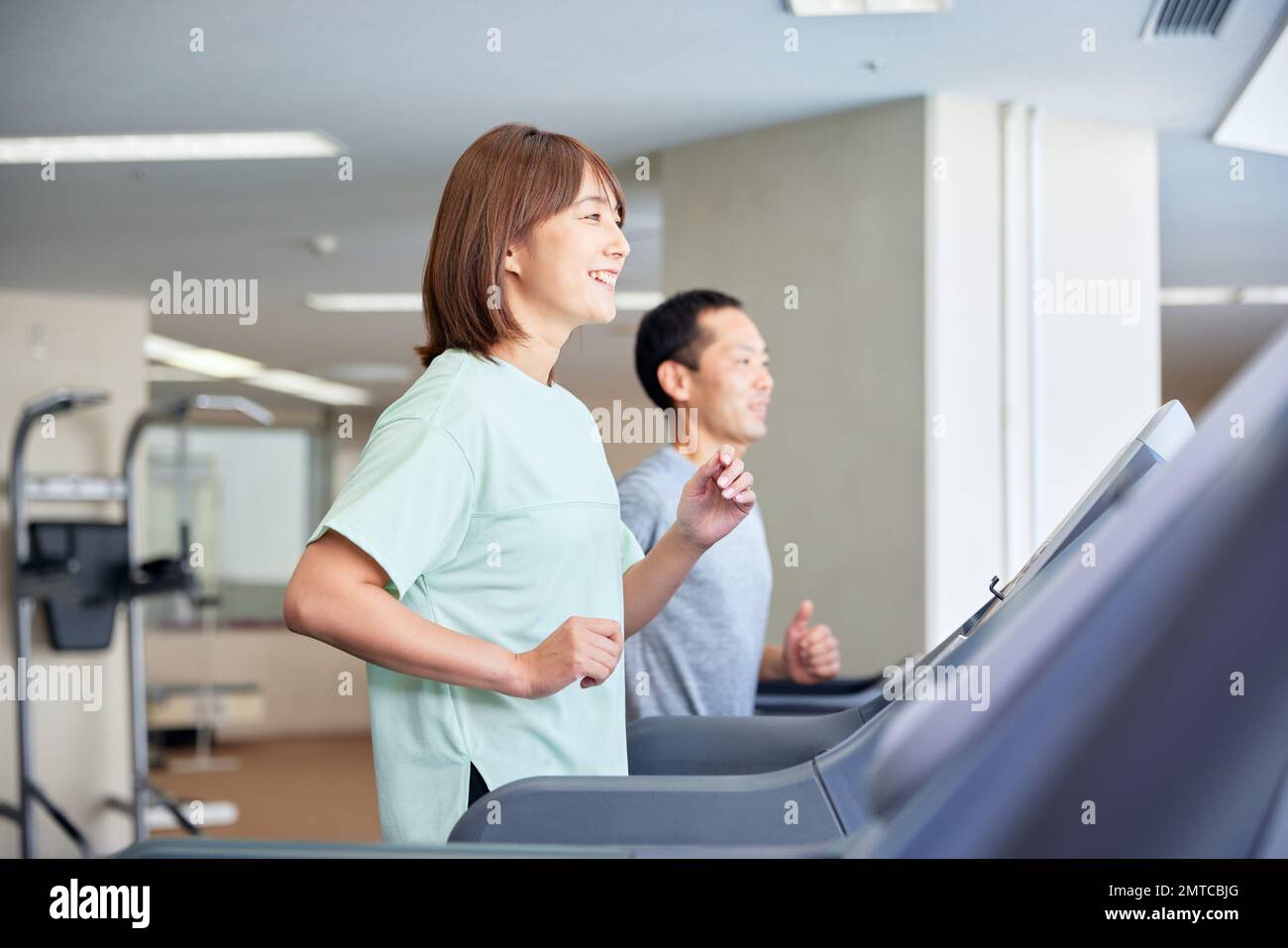 Japanese woman training at indoor gym Stock Photo - Alamy