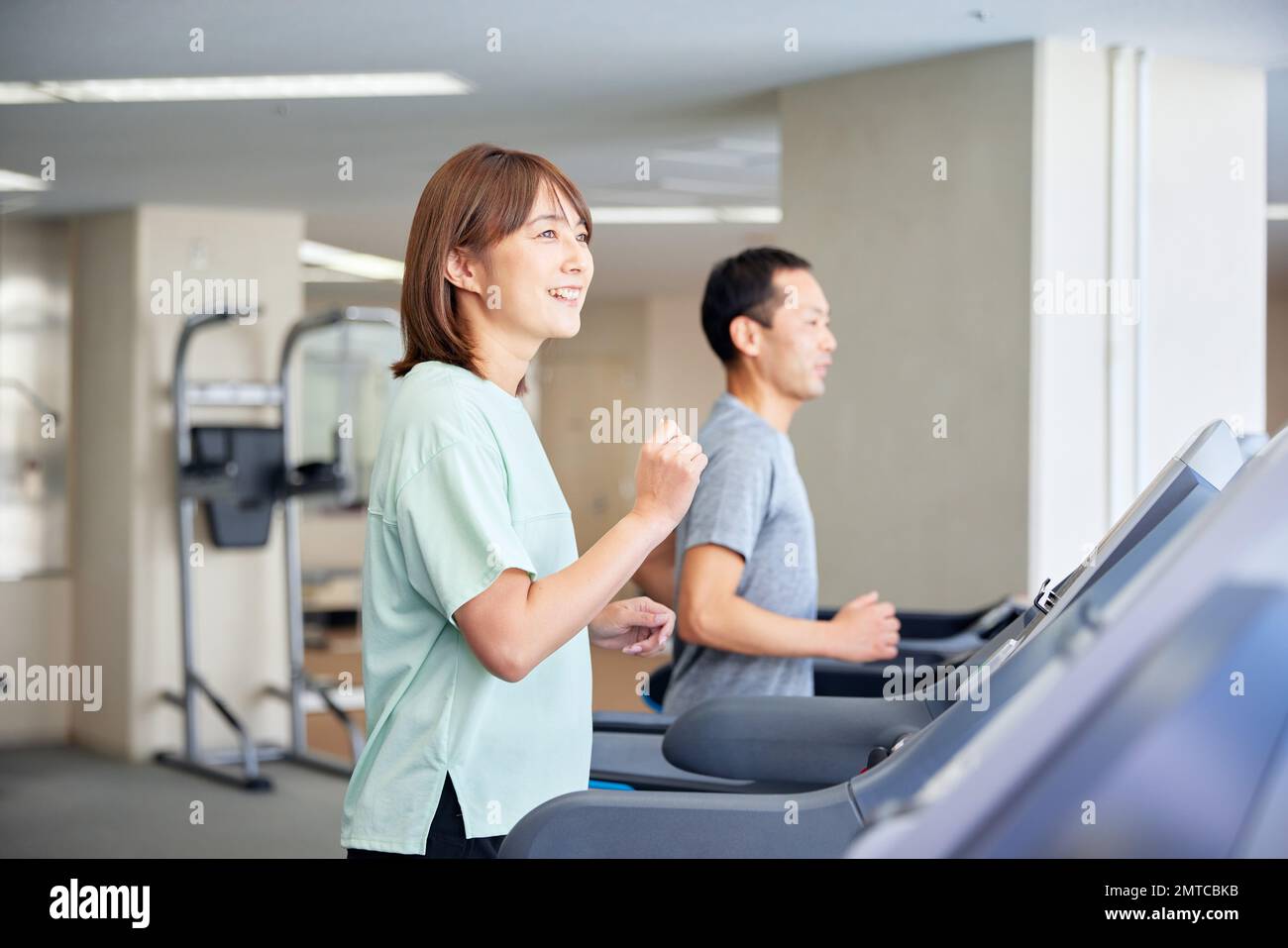 Japanese woman training at indoor gym Stock Photo - Alamy
