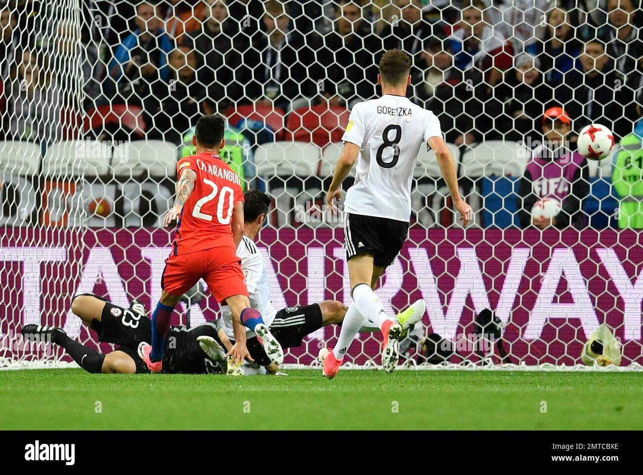 Germany's Lars Stindl, center, scores his side's opening goal during ...