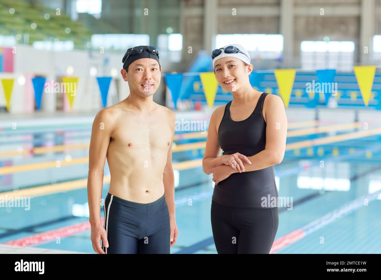 Japanese couple at indoor swimming pool Stock Photo - Alamy