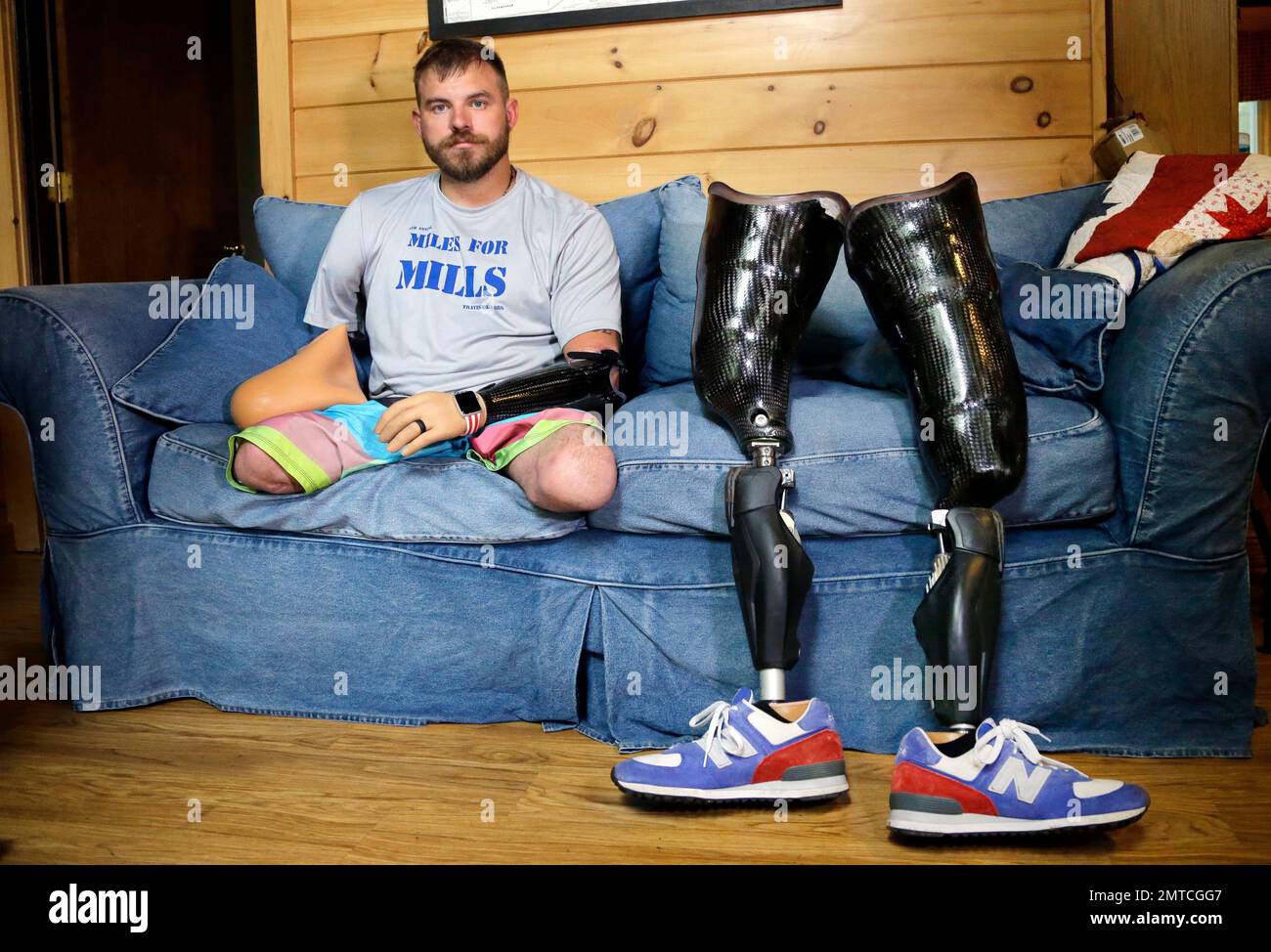 In this June 15, 2017 photo, Travis Mills poses for a photo on his ...