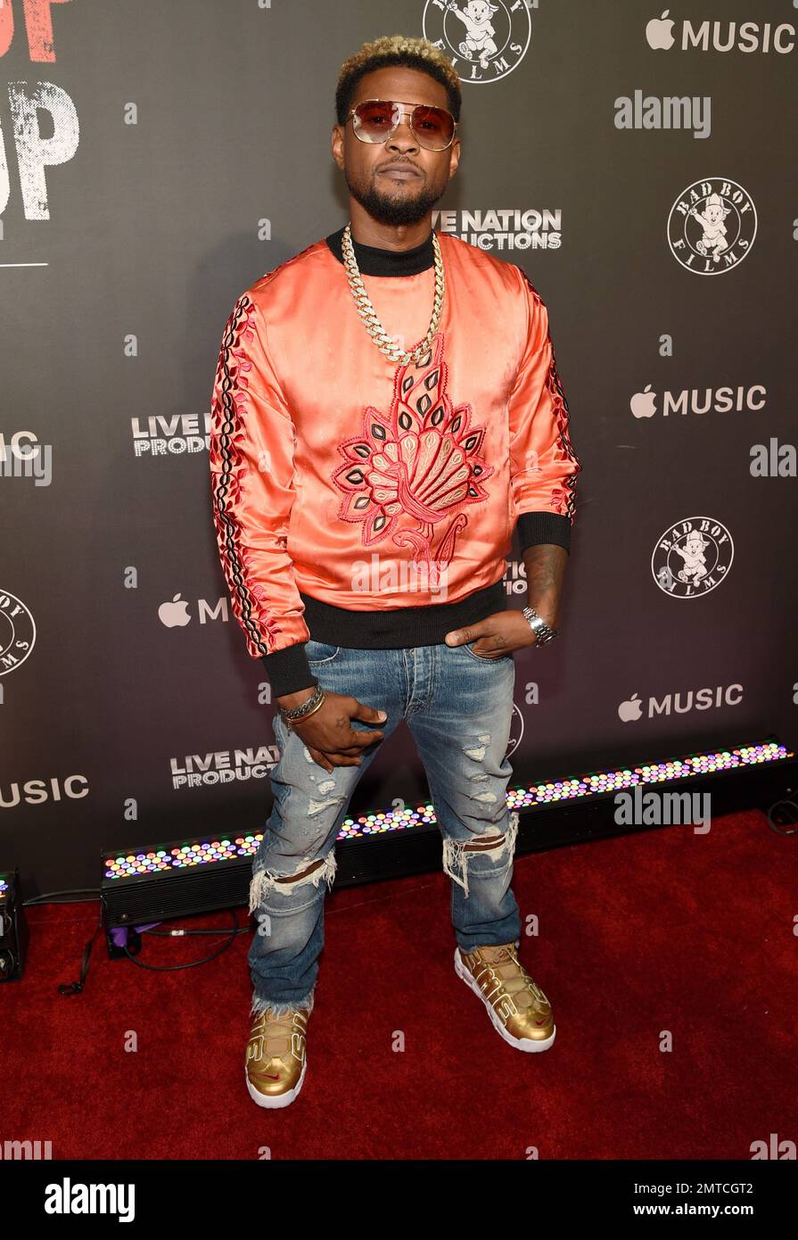 Usher arrives at the Los Angeles premiere of "Can't Stop, Won't Stop: A ...