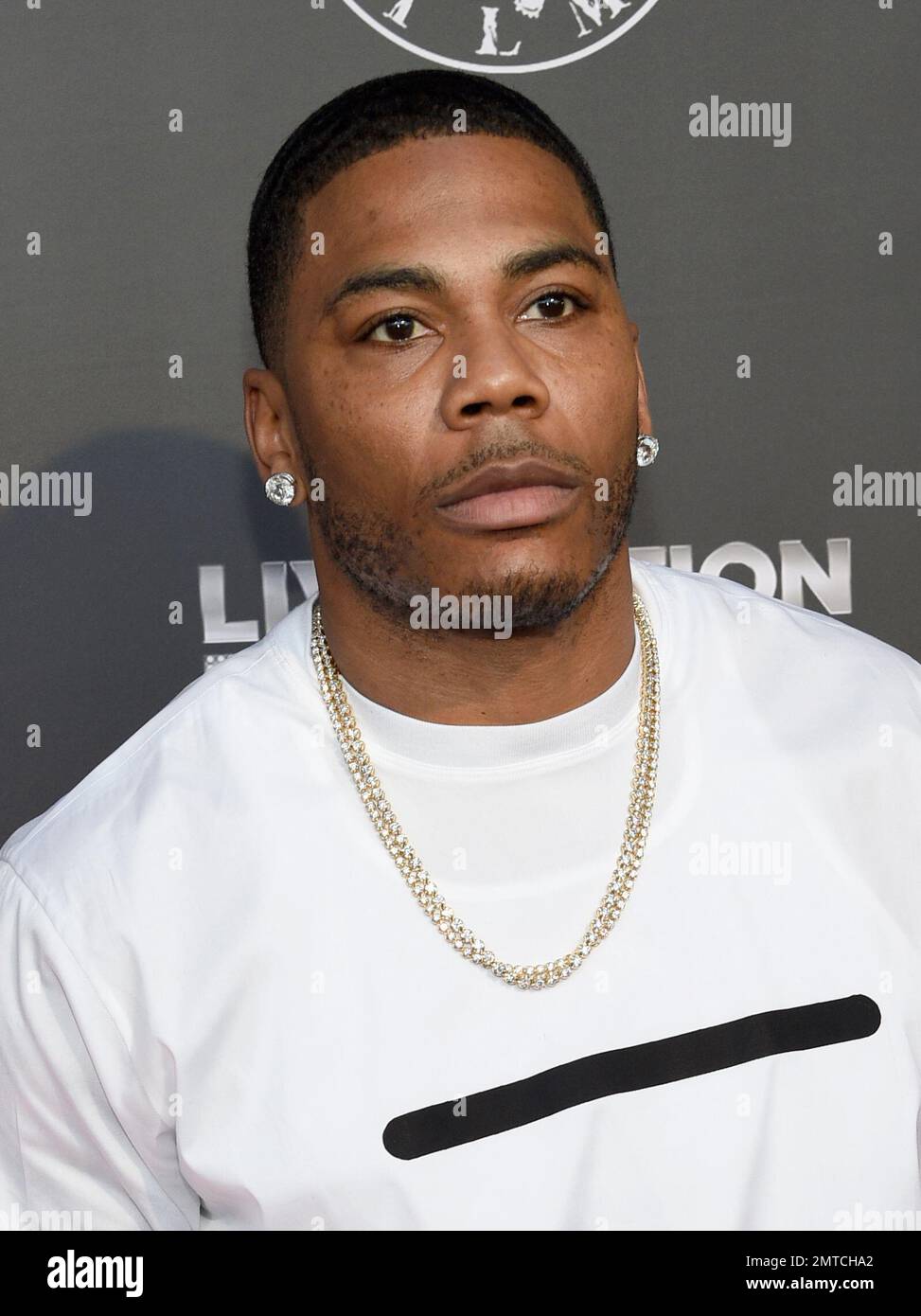 Nelly arrives at the Los Angeles premiere of "Can't Stop, Won't Stop: A ...