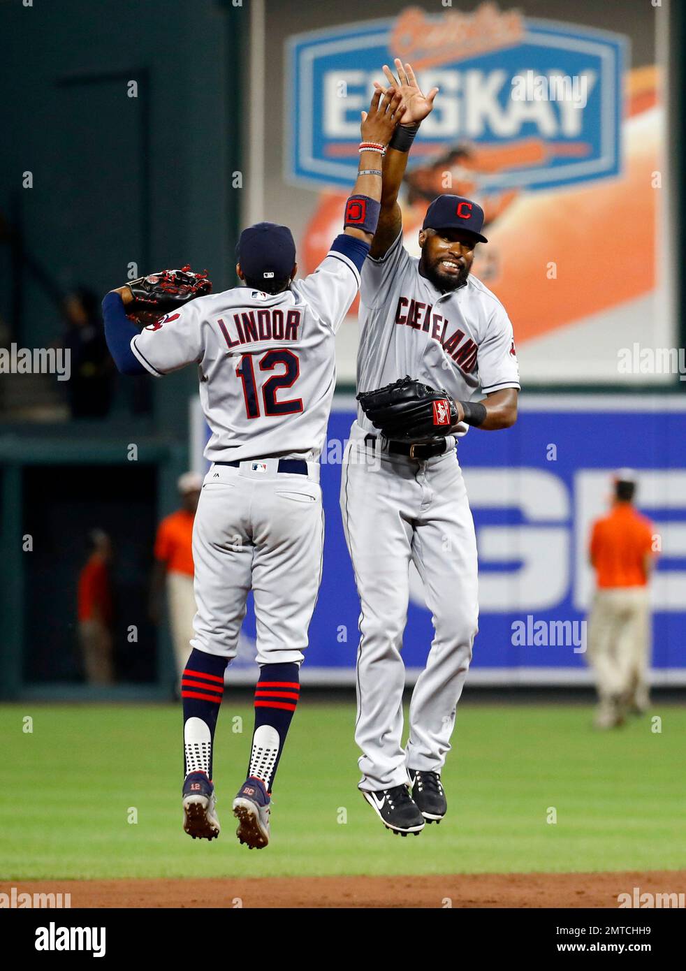 Cleveland Indians shortstop Francisco Lindor, left, and left fielder ...