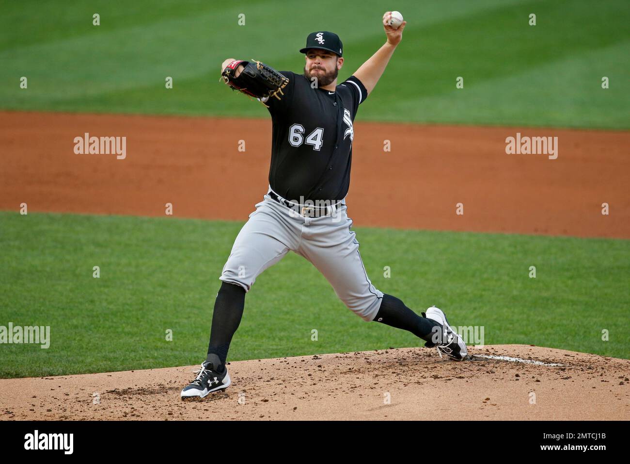 Chicago White Sox starting pitcher David Holmberg throws to the ...