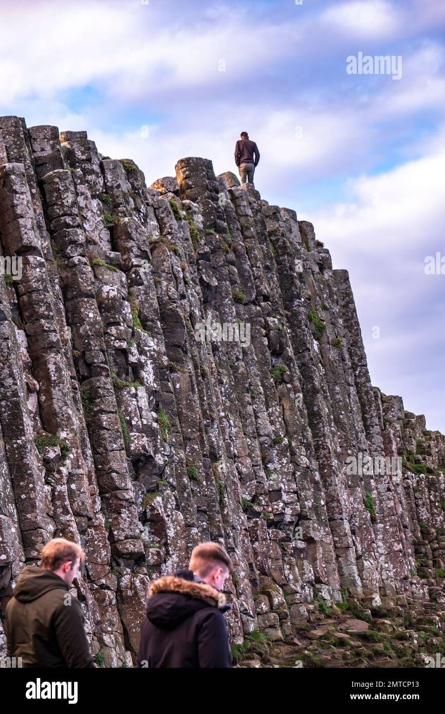 GIANT'S CAUSEWAY, NORTHERN IRELAND, UK - NOVEMBER 05 2022 : People enjoying the 40000 ...