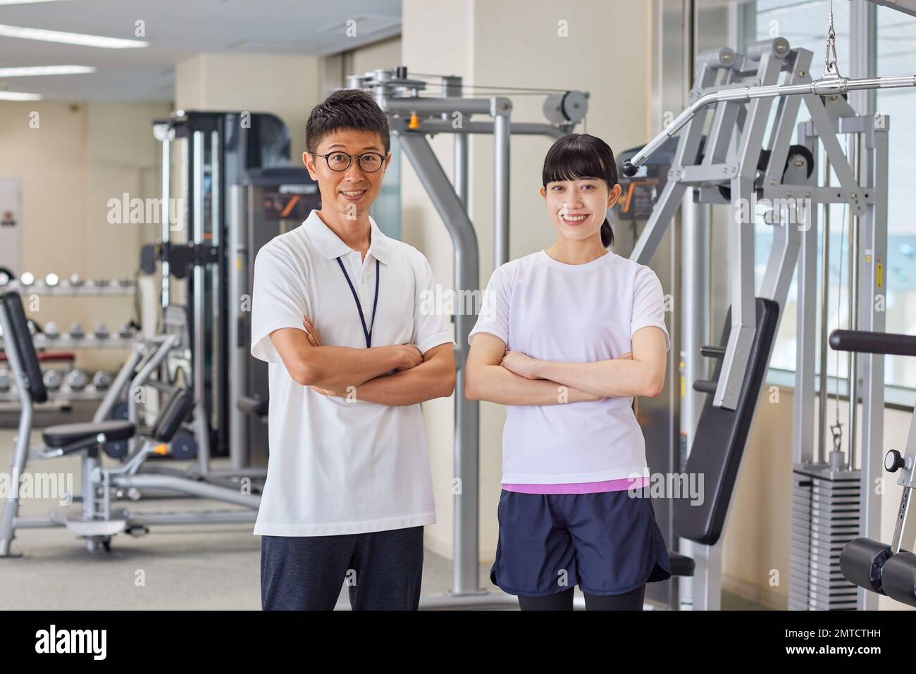 Japanese woman training at indoor gym Stock Photo - Alamy