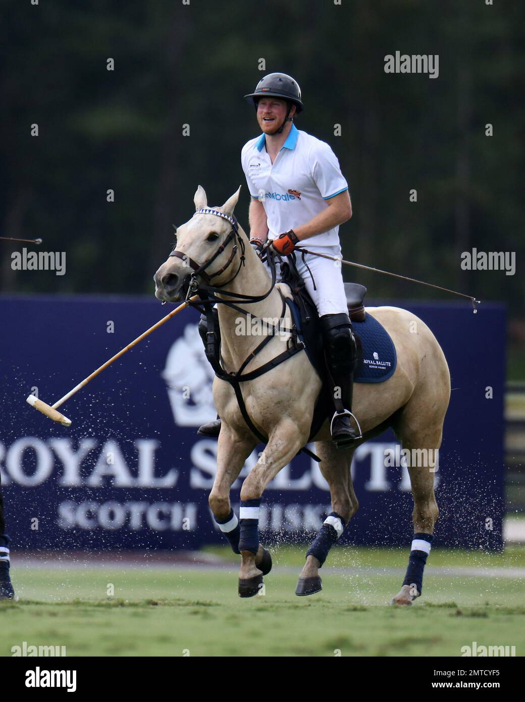 Prince Harry participates at the Sentebale Polo Cup presented by Royal ...