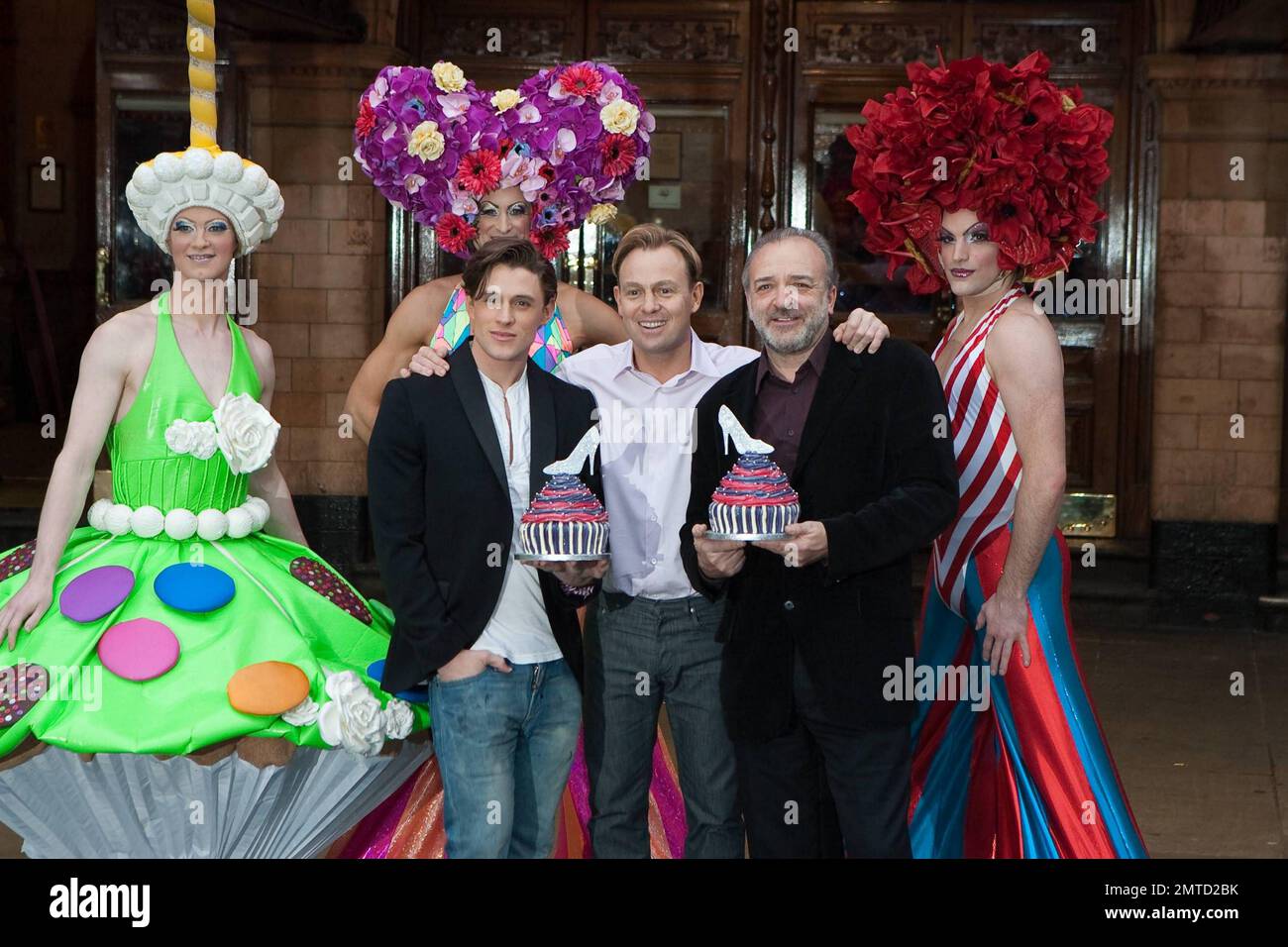 (L-R) Oliver Thornton, Jason Donovan and John Bowe pose with ...
