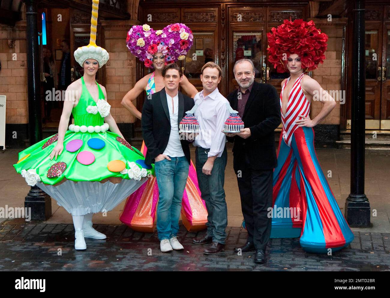 (L-R) Oliver Thornton, Jason Donovan and John Bowe pose with ...
