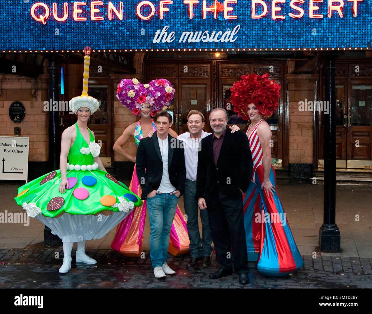 (L-R) Oliver Thornton, Jason Donovan and John Bowe pose with ...