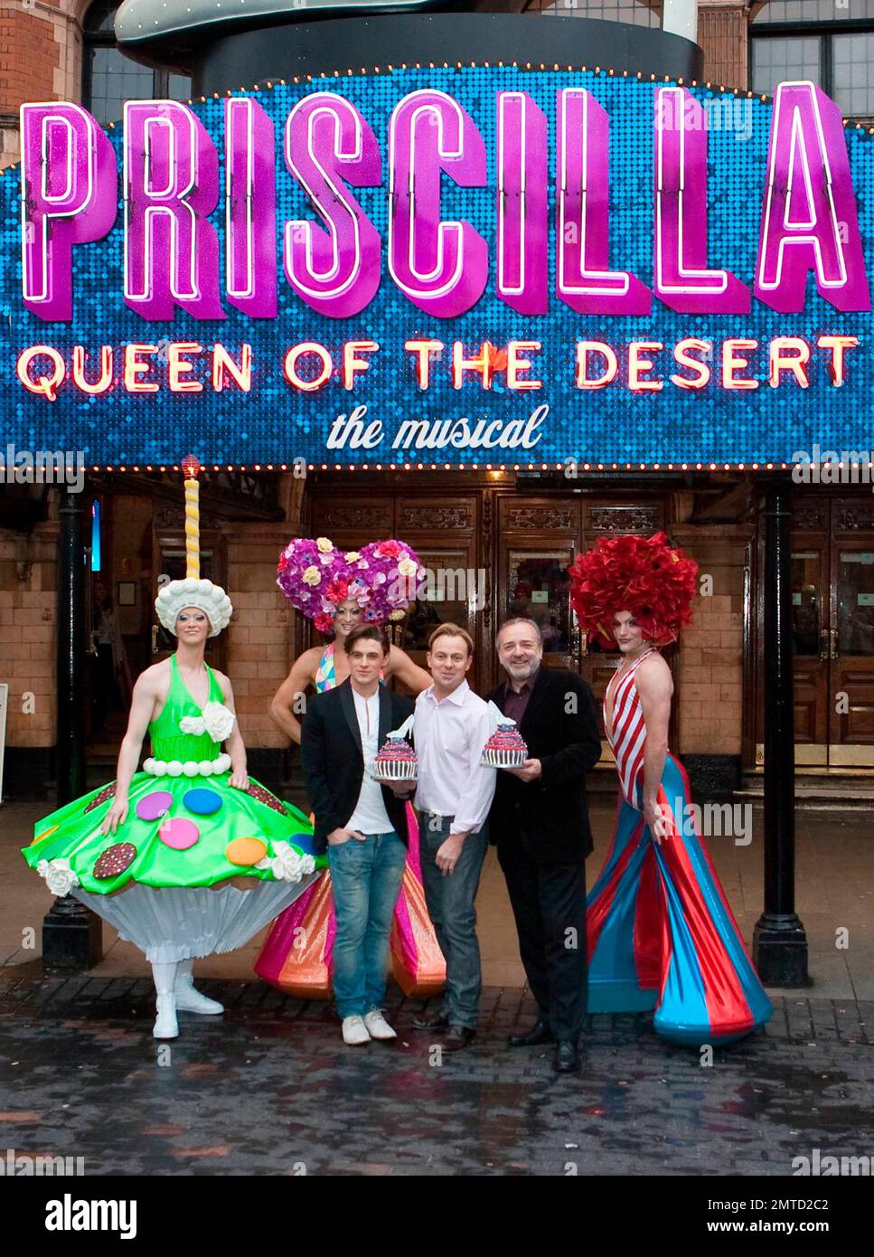 (L-R) Oliver Thornton, Jason Donovan and John Bowe pose with ...